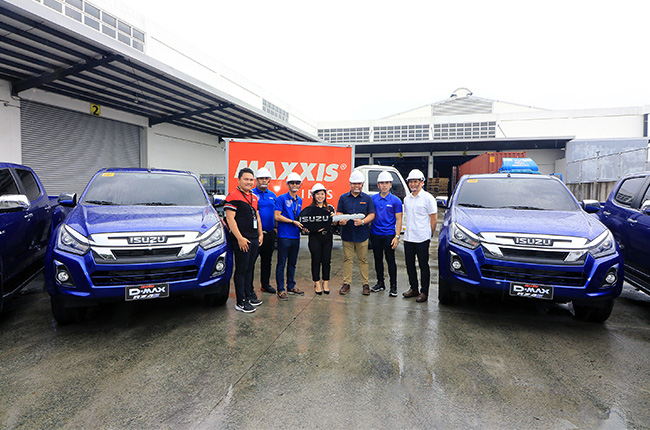 Isuzu PH turns over D-Max units, QKR truck to Excel Trend Group | Autodeal